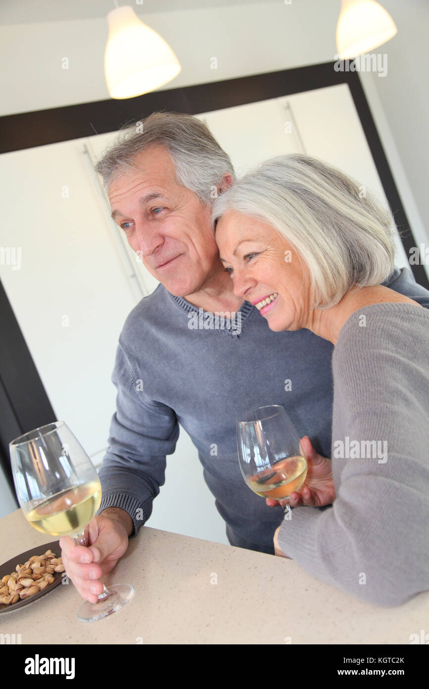 60s couple wine kitchen hi-res stock photography and images - Alamy