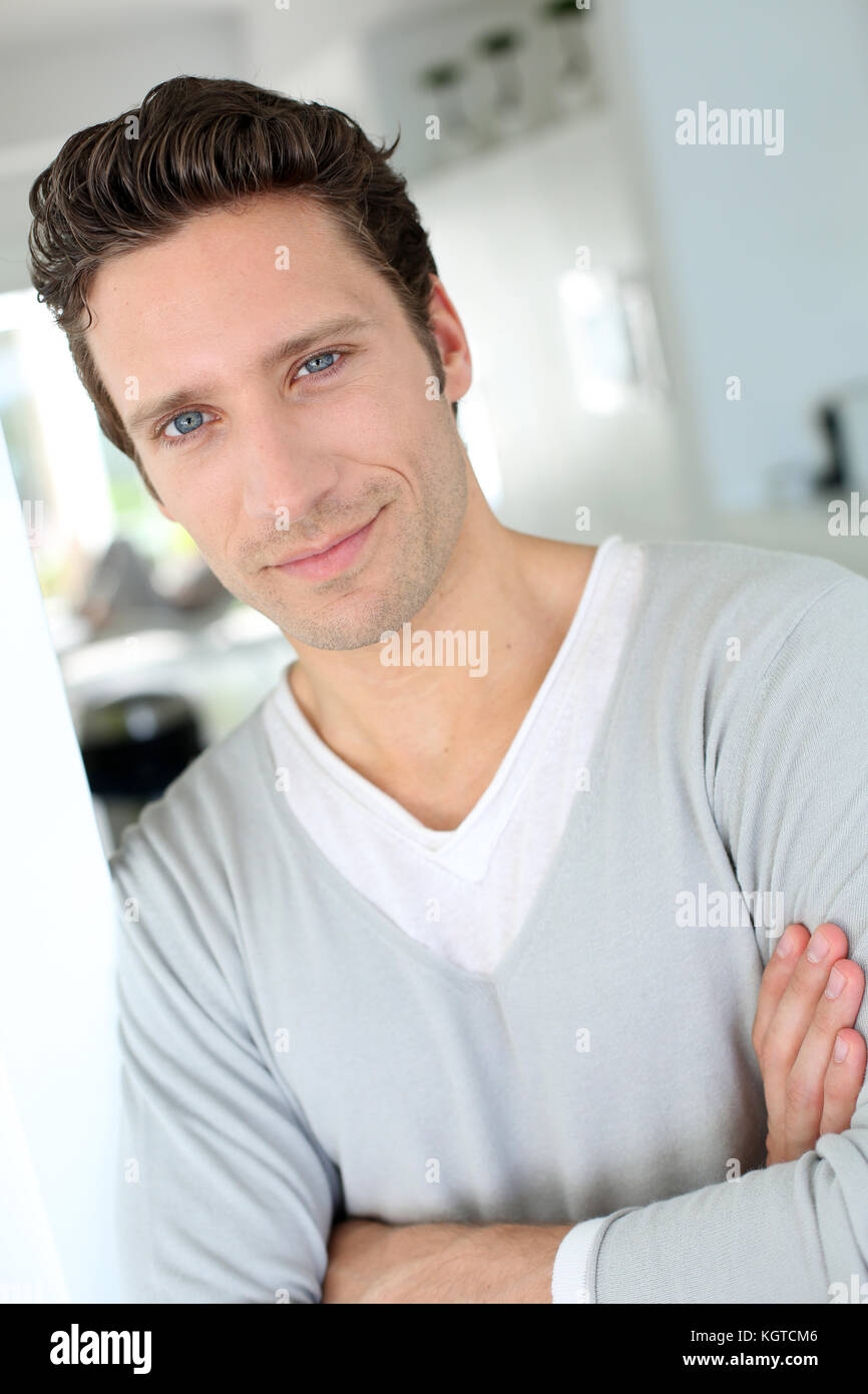Portrait of handsome single man at home Stock Photo - Alamy