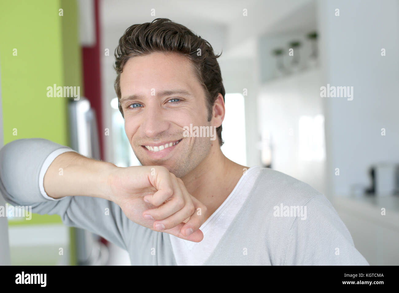 Portrait of handsome single man at home Stock Photo - Alamy