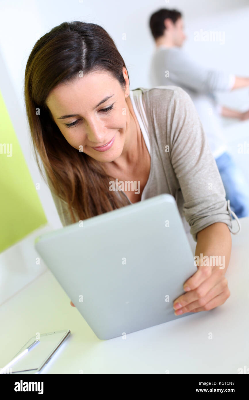 Woman at home looking at recipe on tablet Stock Photo - Alamy