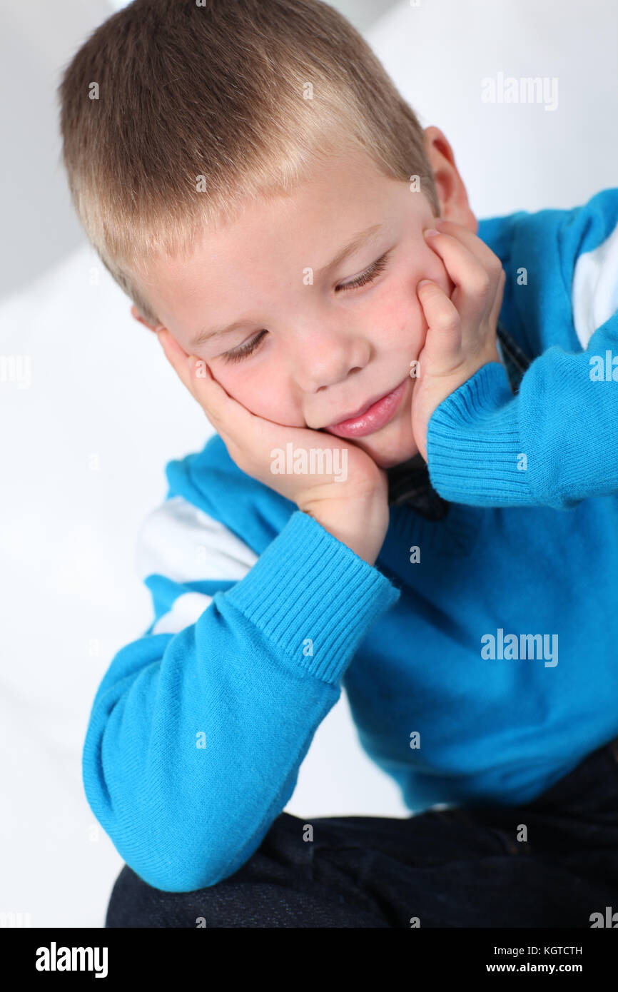 Portrait of kid with upset look Stock Photo - Alamy