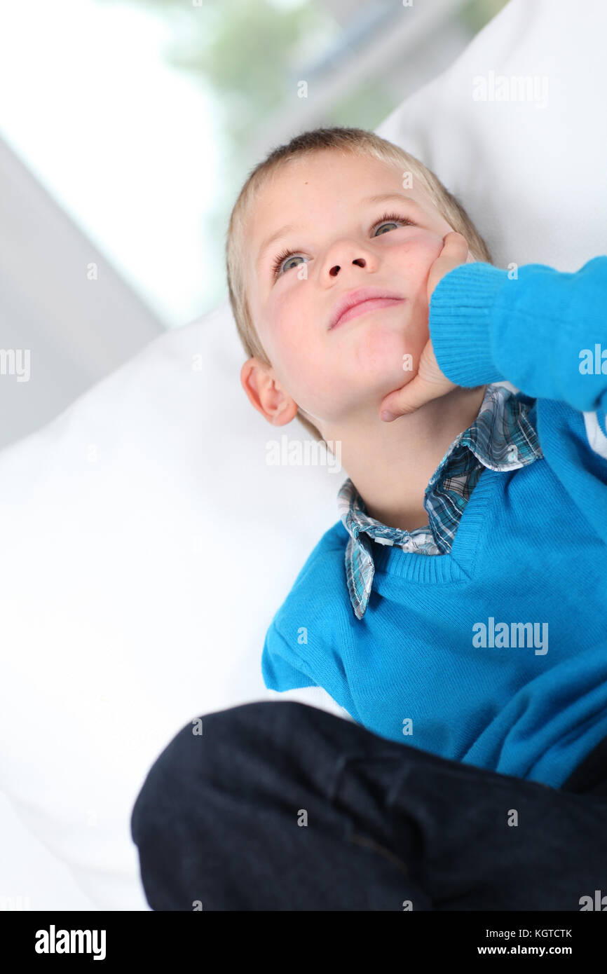 Portrait of kid with thoughtful look Stock Photo - Alamy