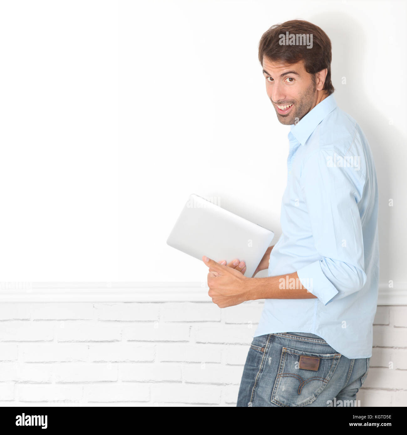 College student using electronic tablet Stock Photo - Alamy