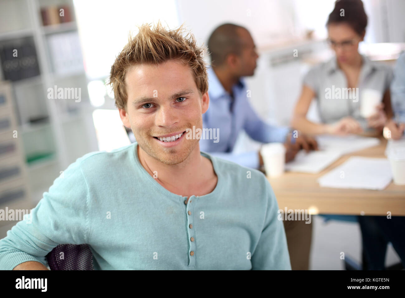 Closeup of young man in business class Stock Photo - Alamy