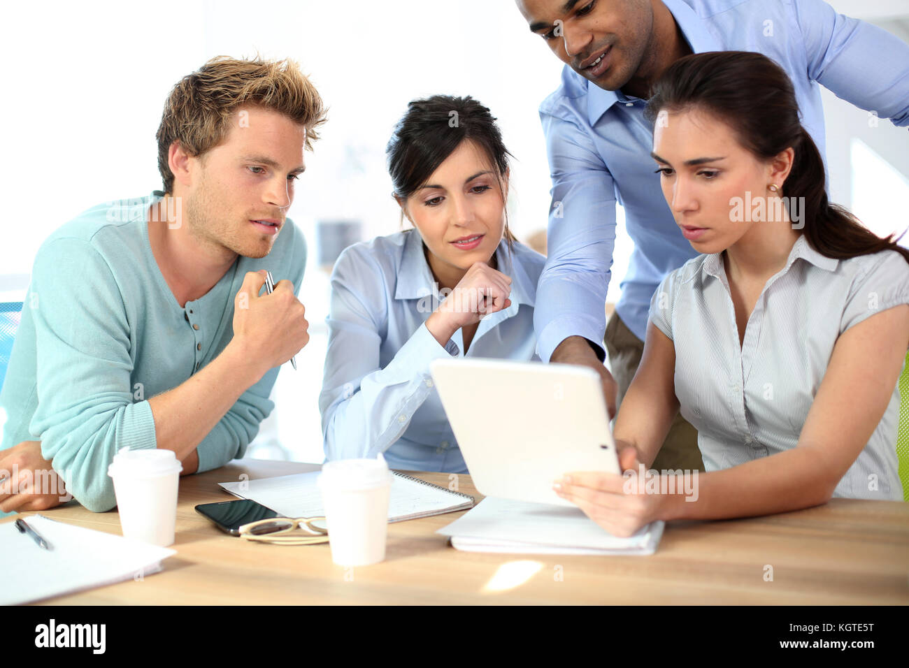 Office Workers Around Table High Resolution Stock Photography and ...
