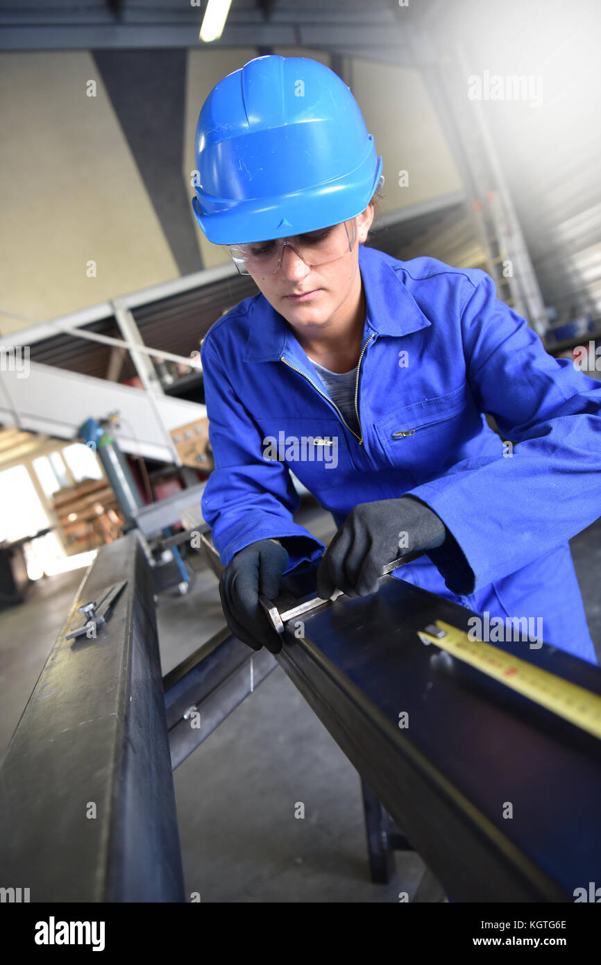 Girl attending metalworks training course Stock Photo - Alamy