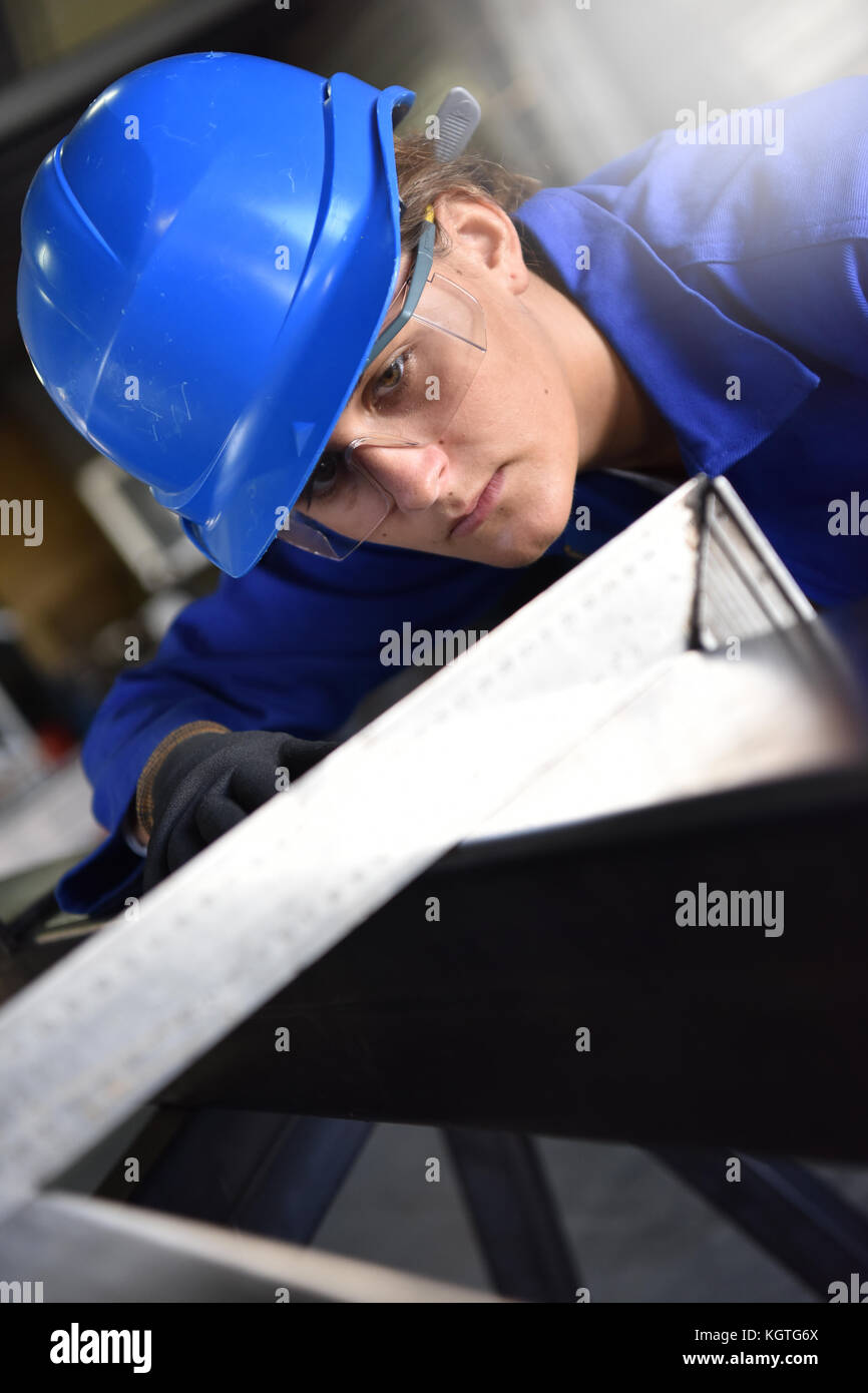 Girl attending metalworks training course Stock Photo - Alamy