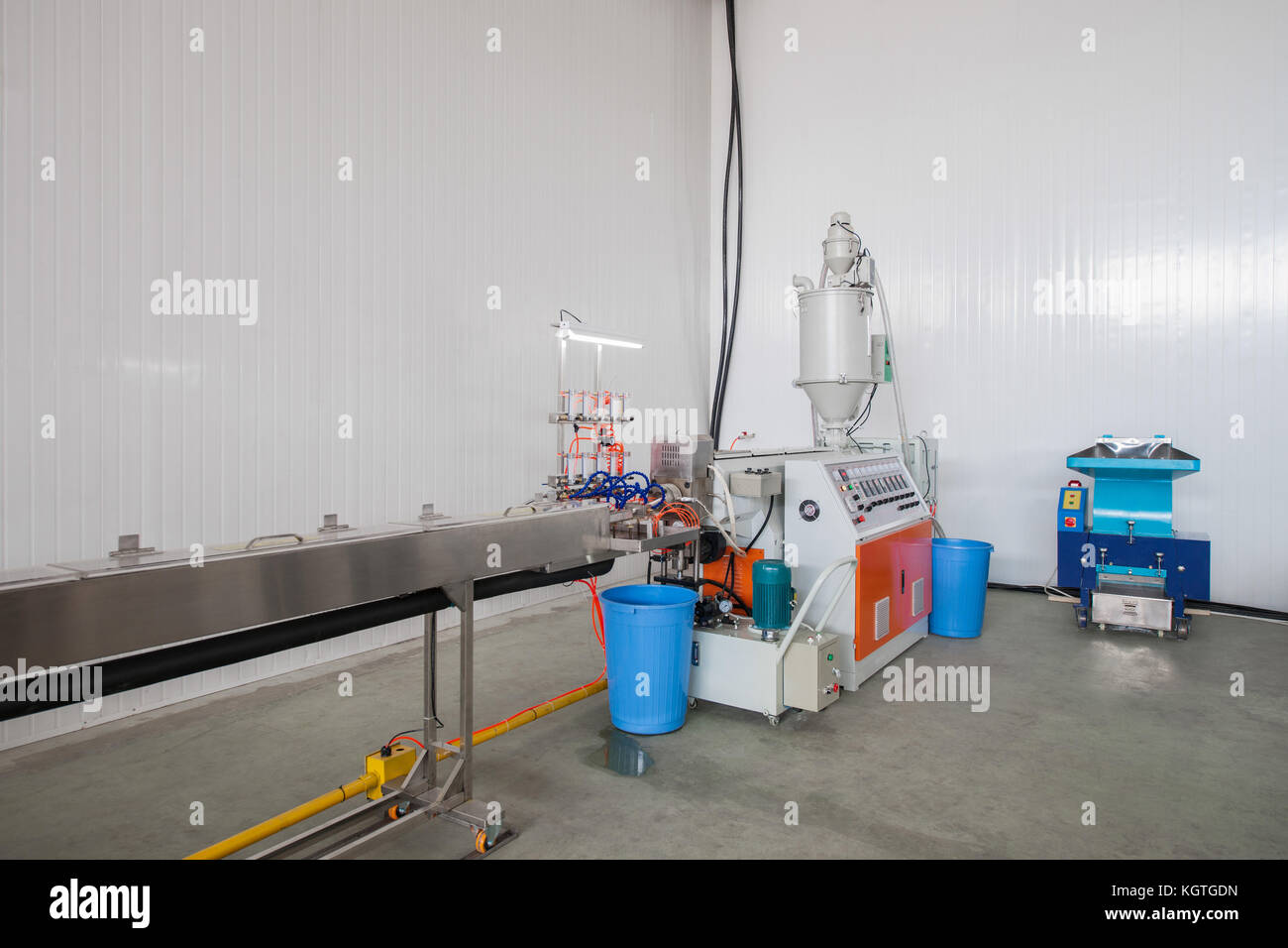 press form the machine produces a plastic profile for windows. workshop ...