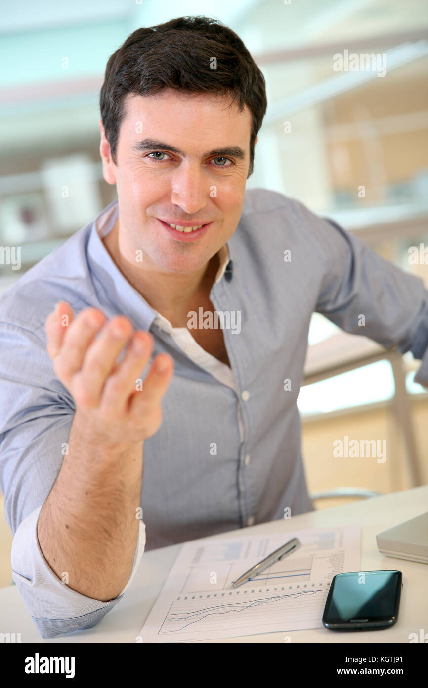 Man giving interview to job applicant Stock Photo - Alamy
