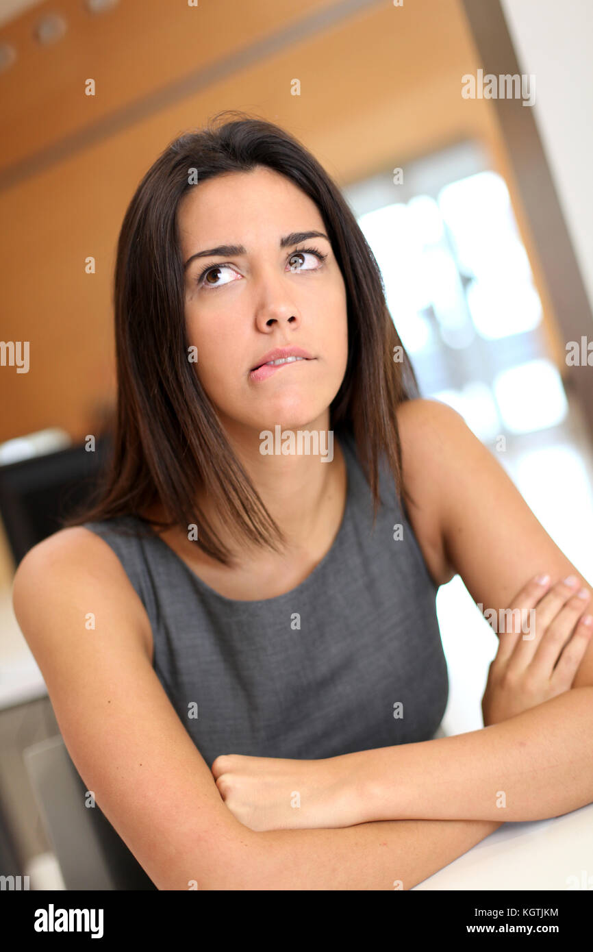 Portrait of office-worker with puzzled look Stock Photo - Alamy