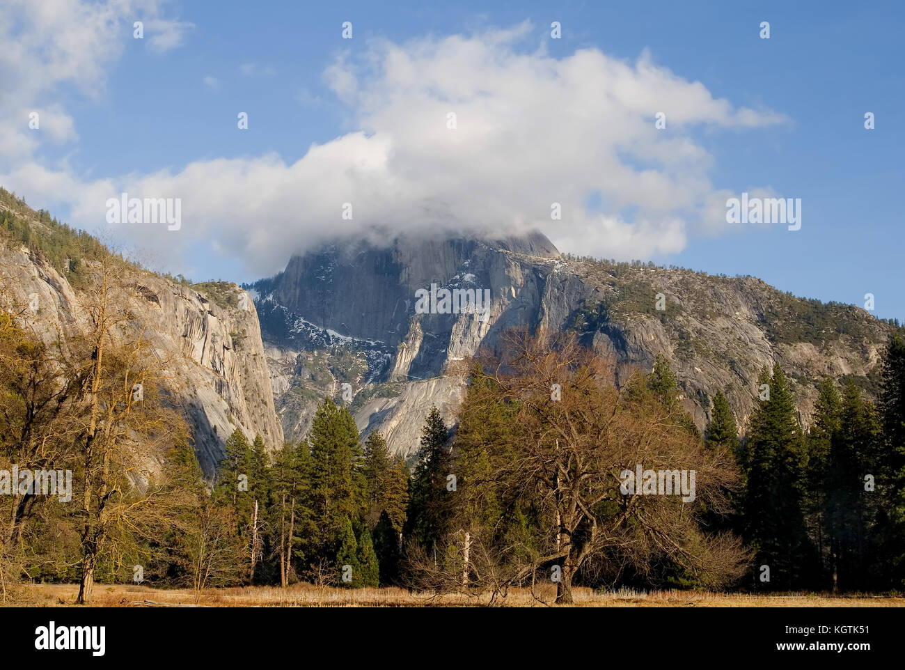 Half Dome covered in fog in Yosemite National park close-up Stock Photo ...