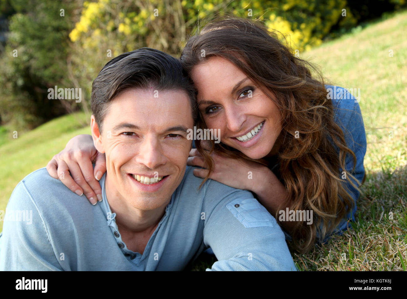 Couple relaxing in home garden Stock Photo - Alamy Couple relaxing in home garden Stock Photo - Alamy