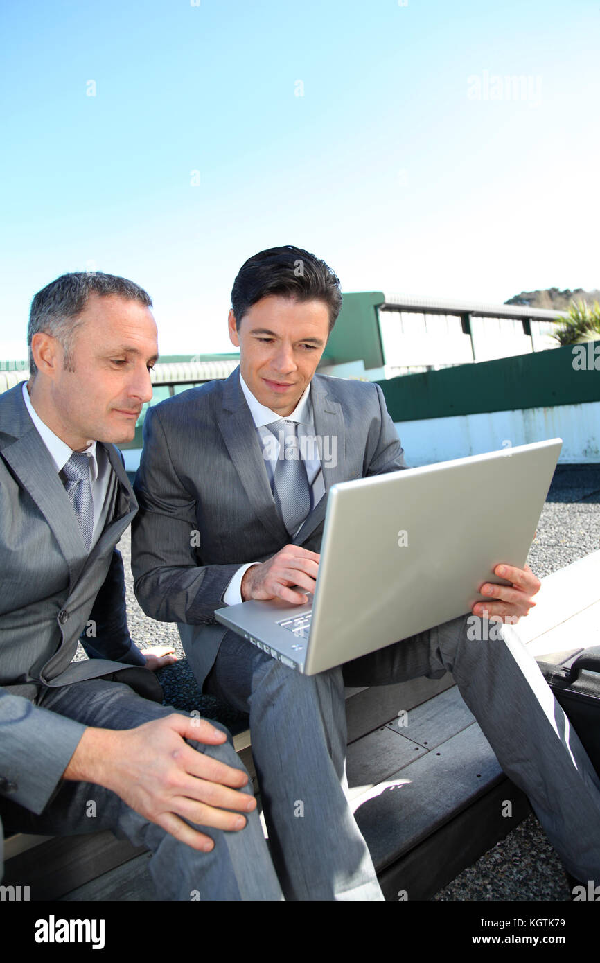 Sales people meeting outside the office Stock Photo - Alamy