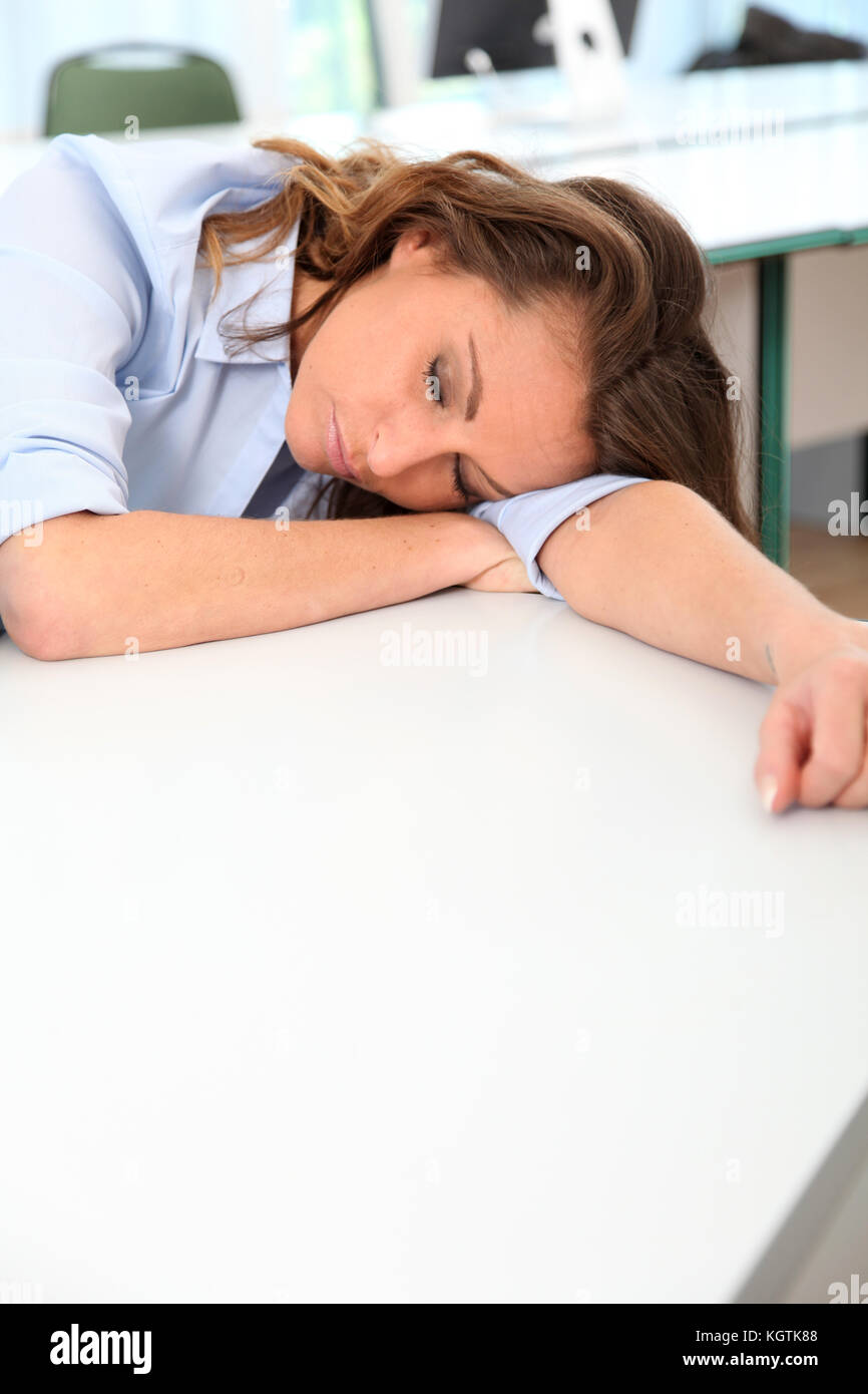 Portrait of exhausted office worker Stock Photo - Alamy