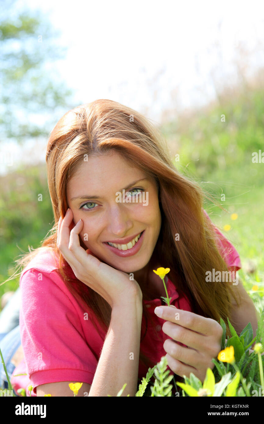 Beautiful woman laying down flowers hi-res stock photography and images ...