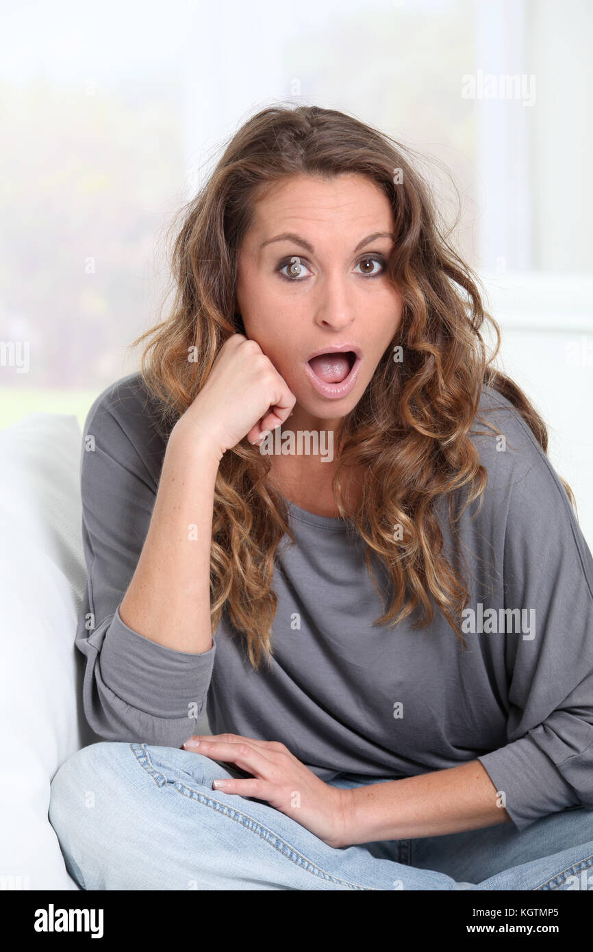 Portrait of woman with surprised look Stock Photo - Alamy