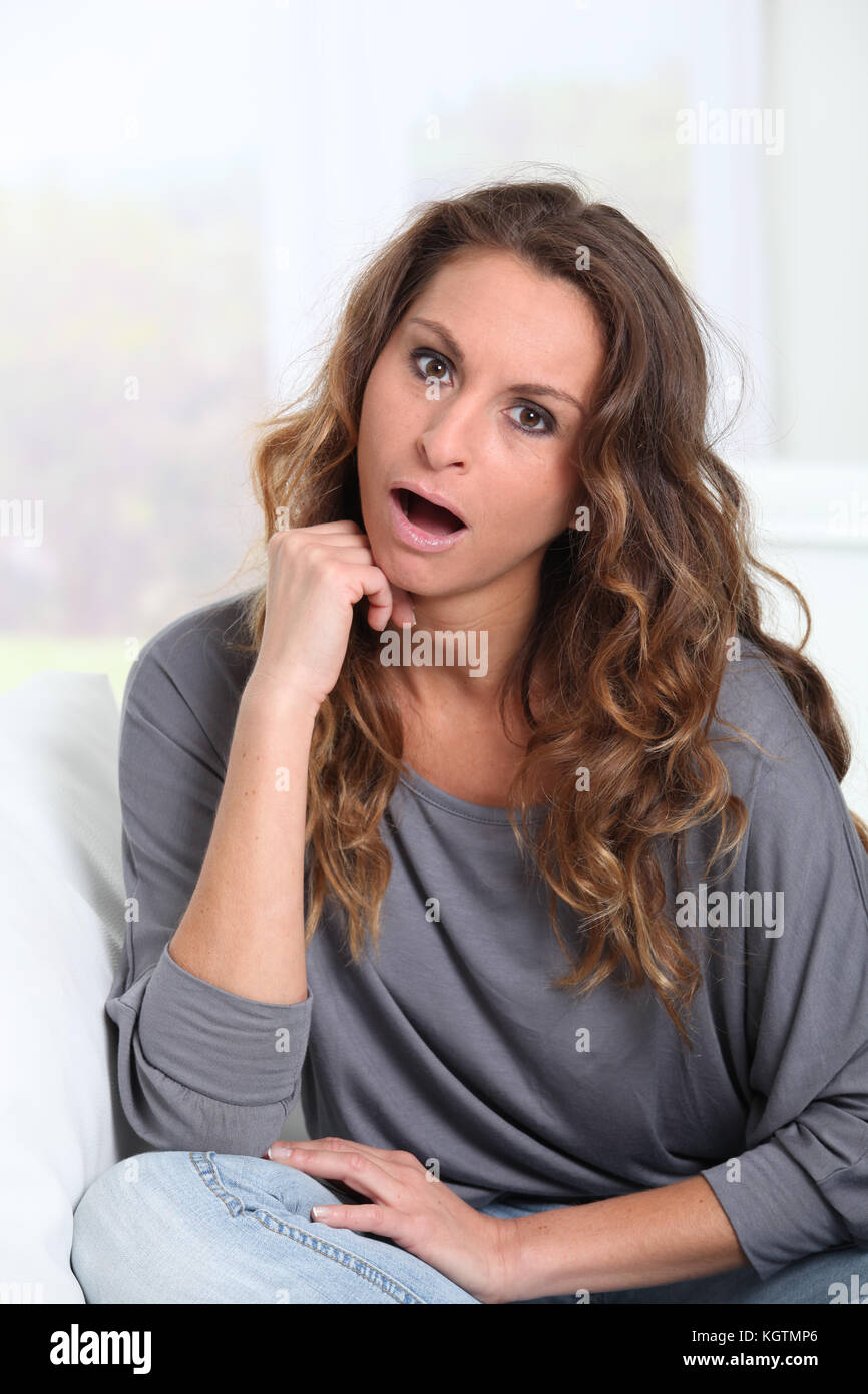 Portrait of woman with surprised look Stock Photo - Alamy