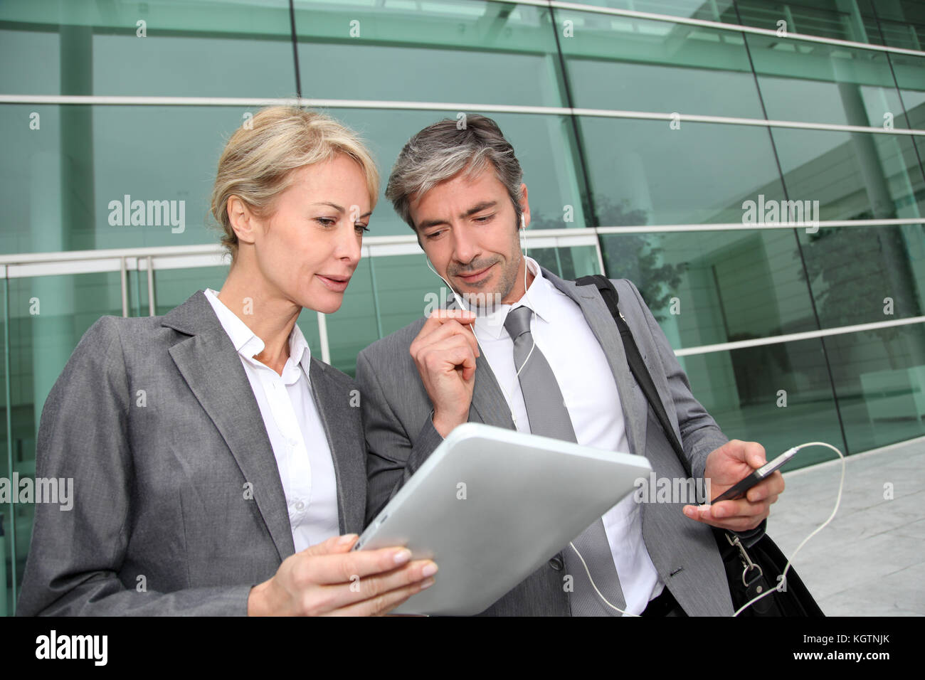 People talking outside bank building hi-res stock photography and ...
