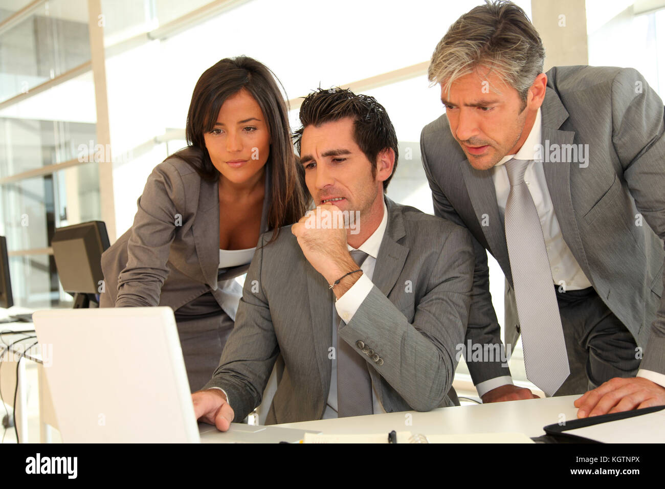 Sales team having business presentation in office Stock Photo - Alamy