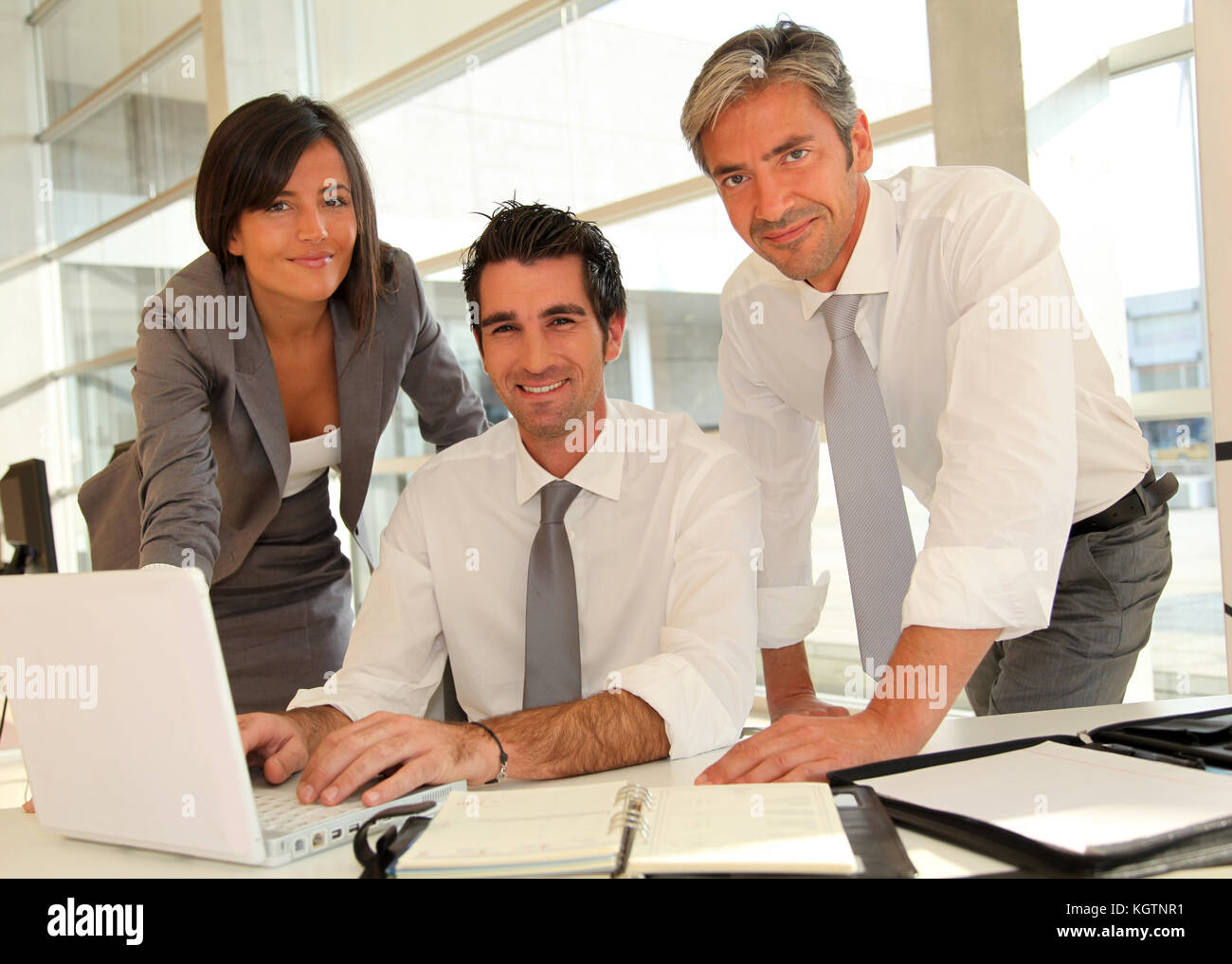 Sales team having business presentation in office Stock Photo - Alamy