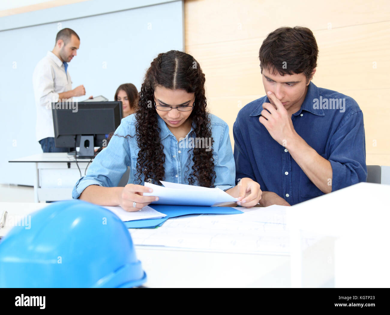 Workgroup in training course Stock Photo - Alamy