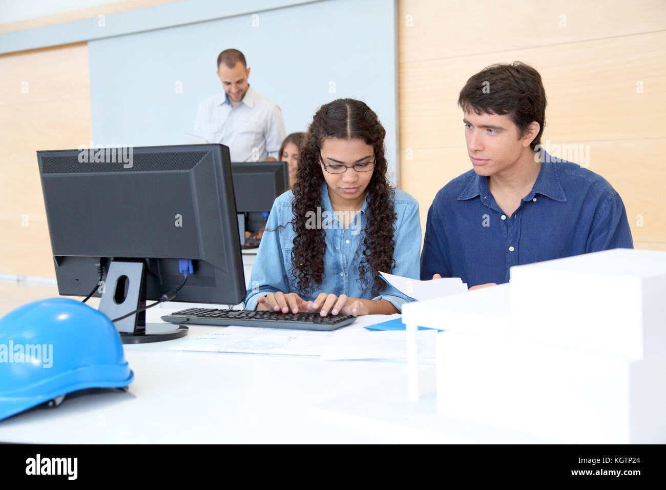 Workgroup in training course Stock Photo - Alamy