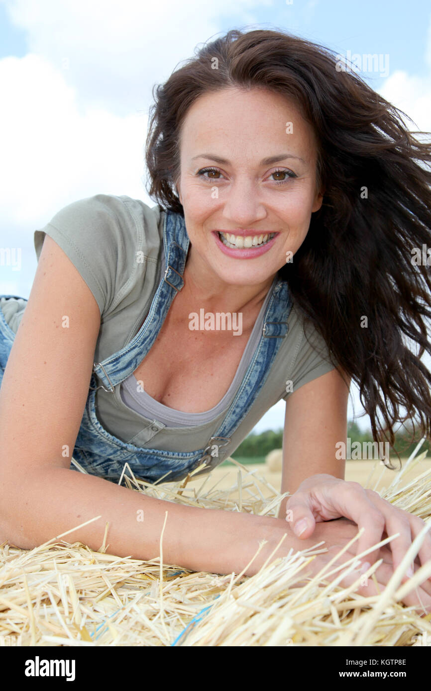 Woman laying hay hi-res stock photography and images - Alamy