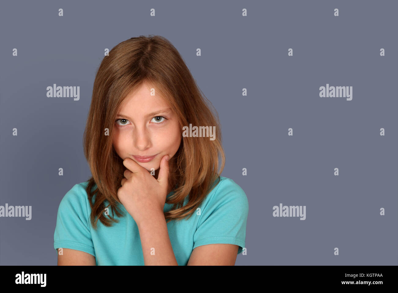 Portrait of young girl with upset look Stock Photo - Alamy