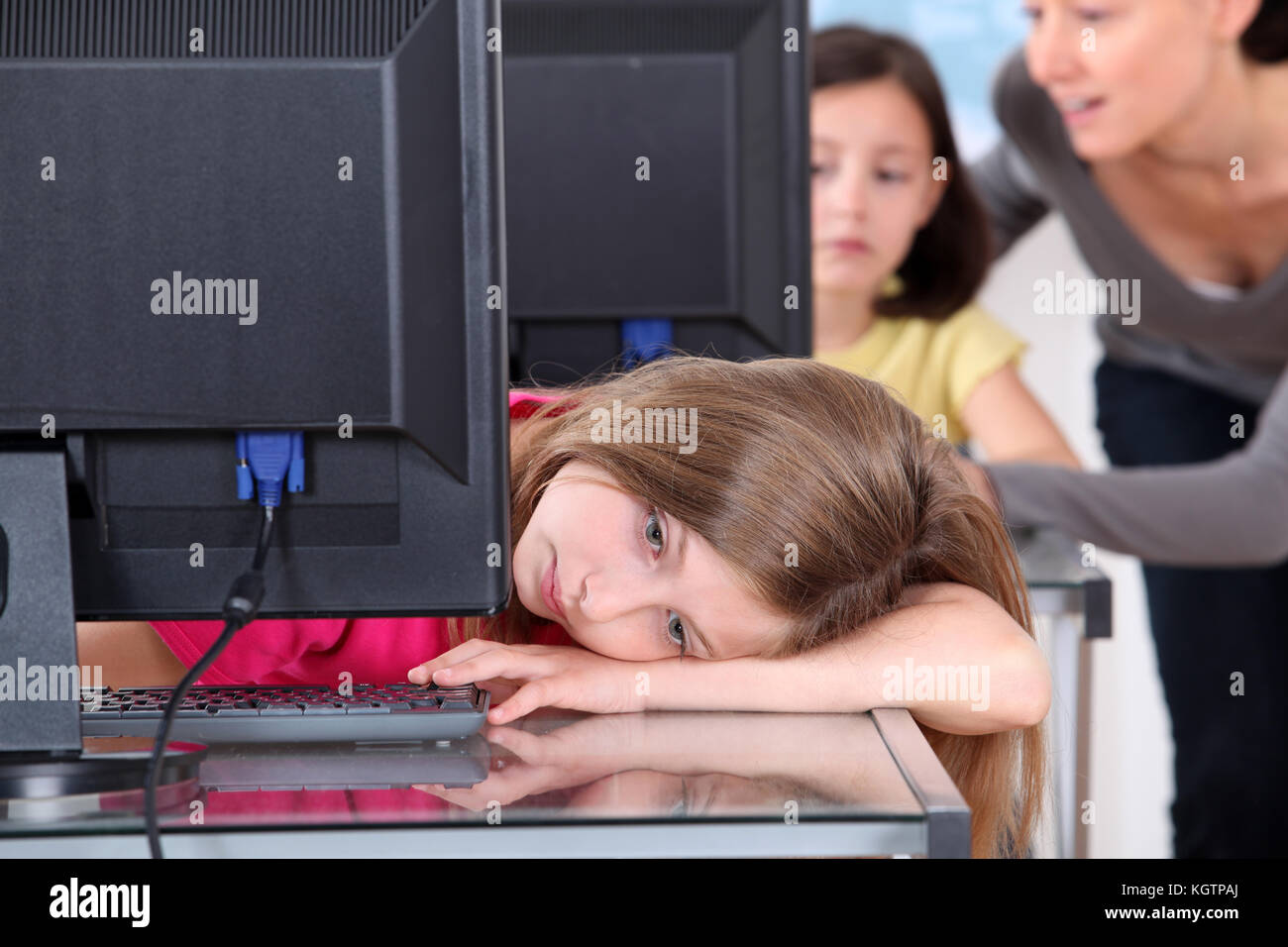 Portrait of exhausted school girl in class Stock Photo - Alamy