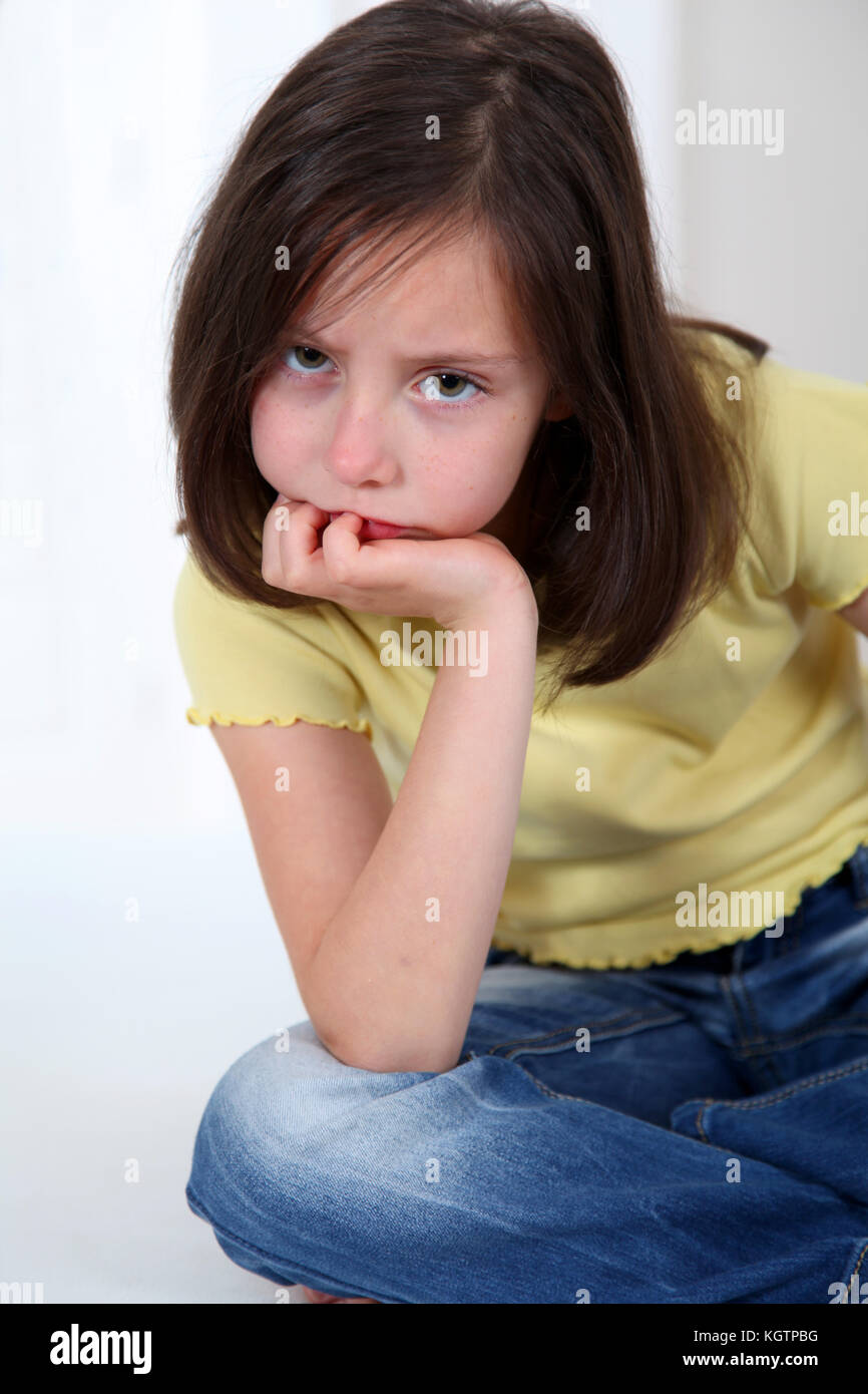 Portrait of grouchy little girl Stock Photo - Alamy