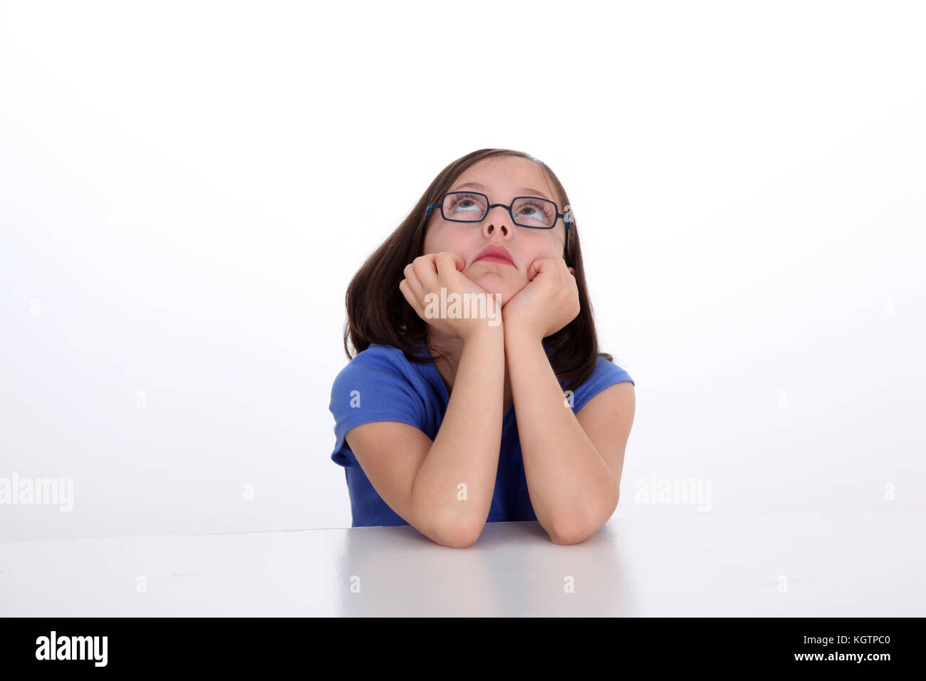 Portrait of little girl with thoughtful look Stock Photo - Alamy