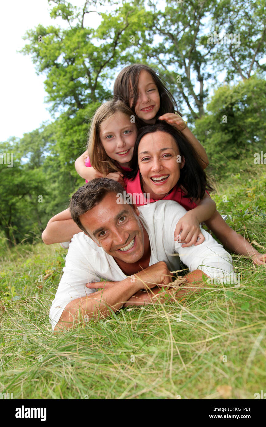 Portrait of happy family in countryside Stock Photo - Alamy