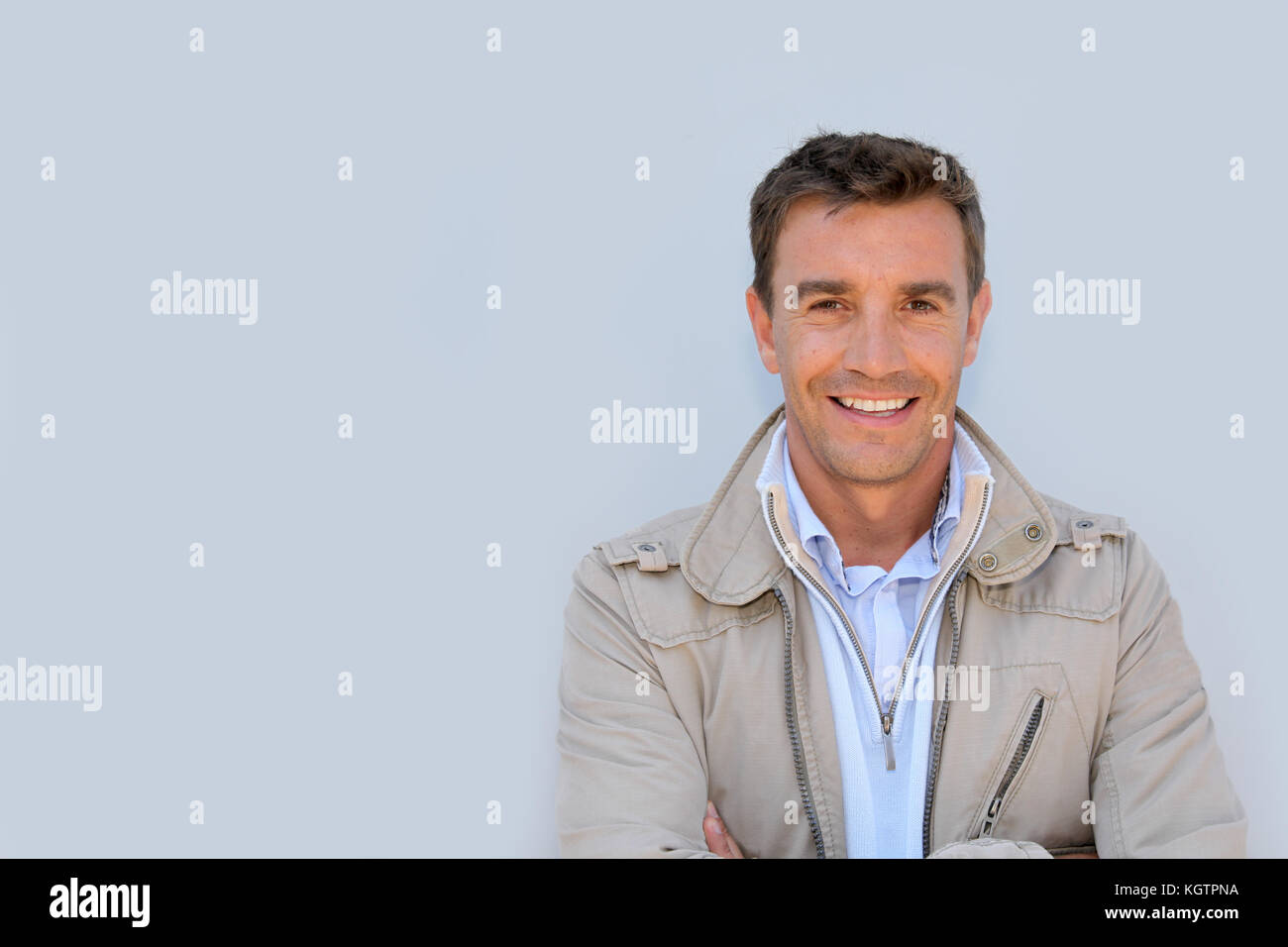 Portrait of handsome man with jacket Stock Photo - Alamy