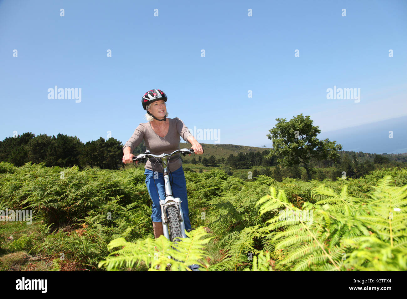 Old woman senior bike hi-res stock photography and images - Alamy