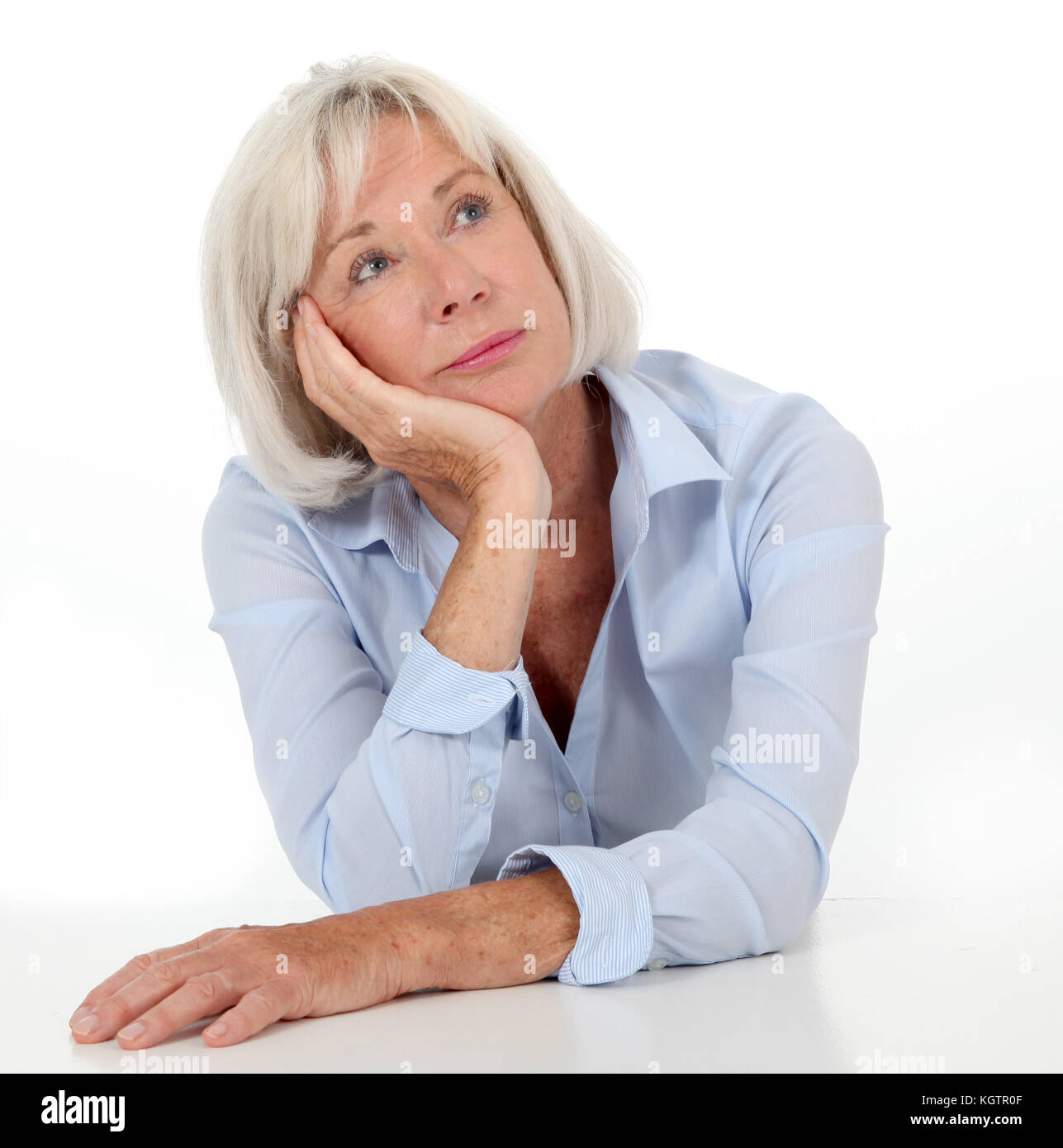 Portrait of senior woman with bored expression Stock Photo - Alamy