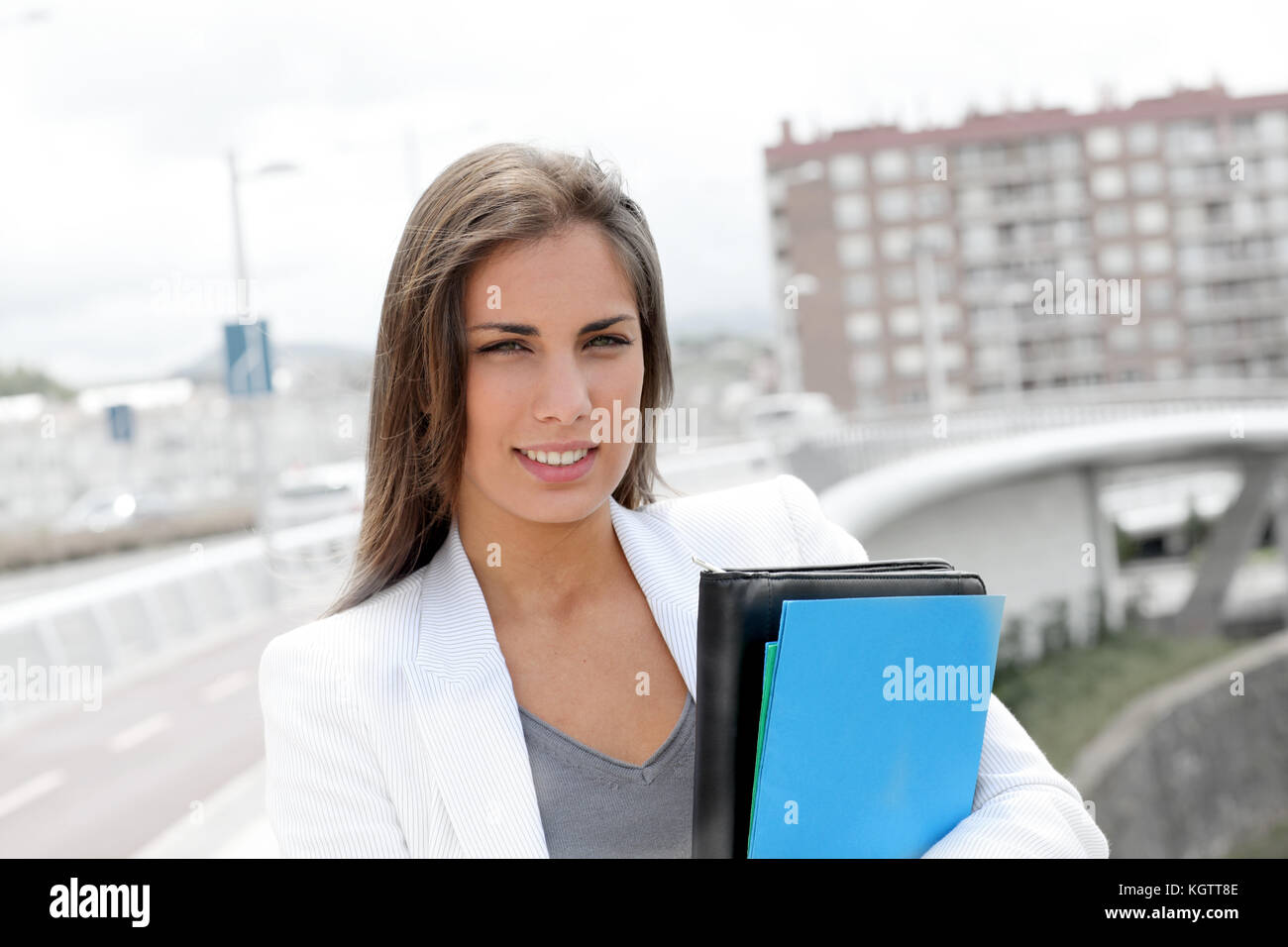 College student standing outside college campus Stock Photo - Alamy