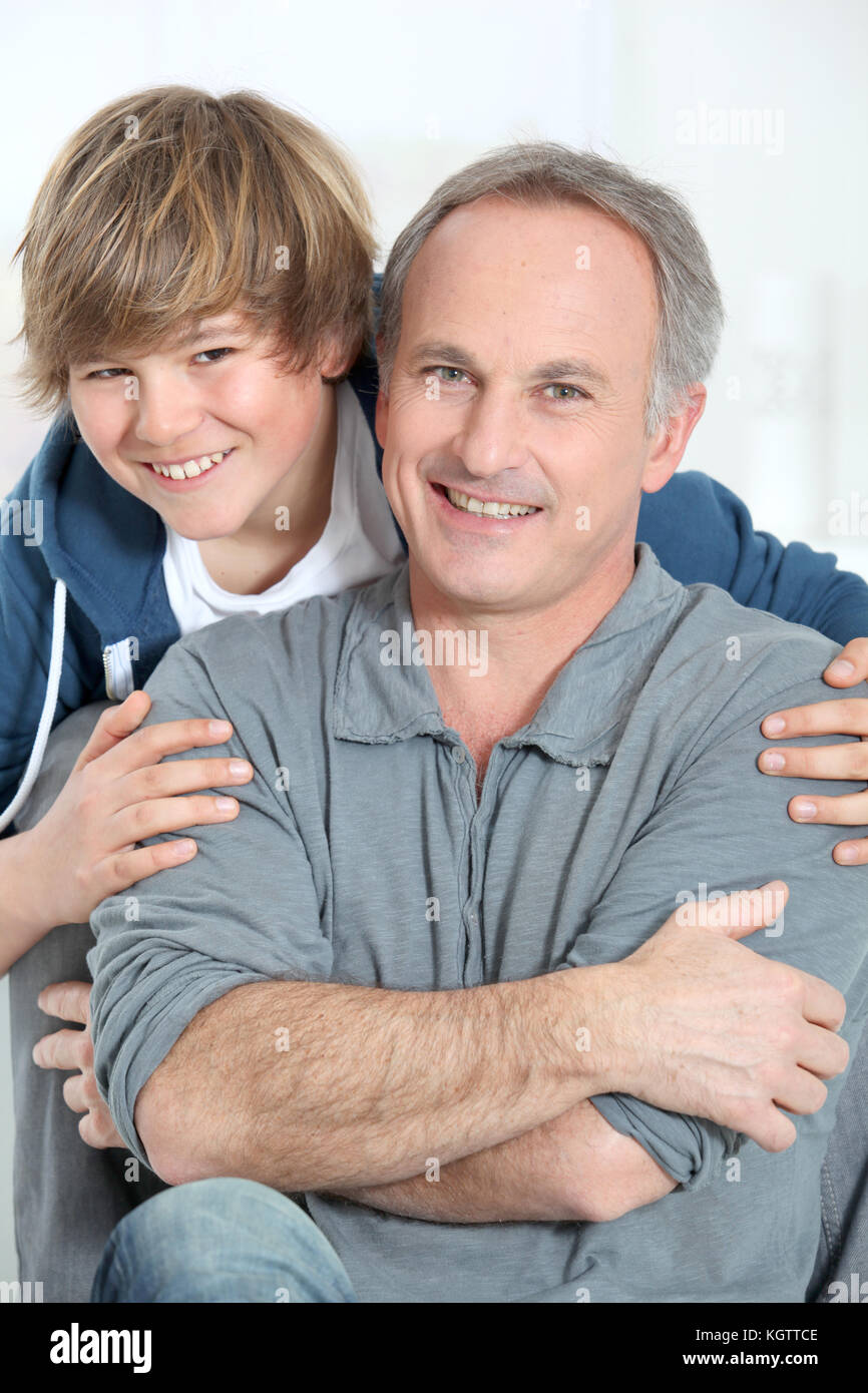 Portait of smiling father and son Stock Photo - Alamy