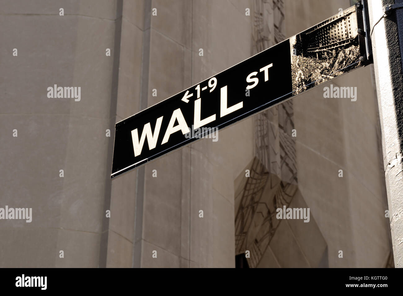 Wall Street sign in the corner of New York Stock Exchange, an icon of ...