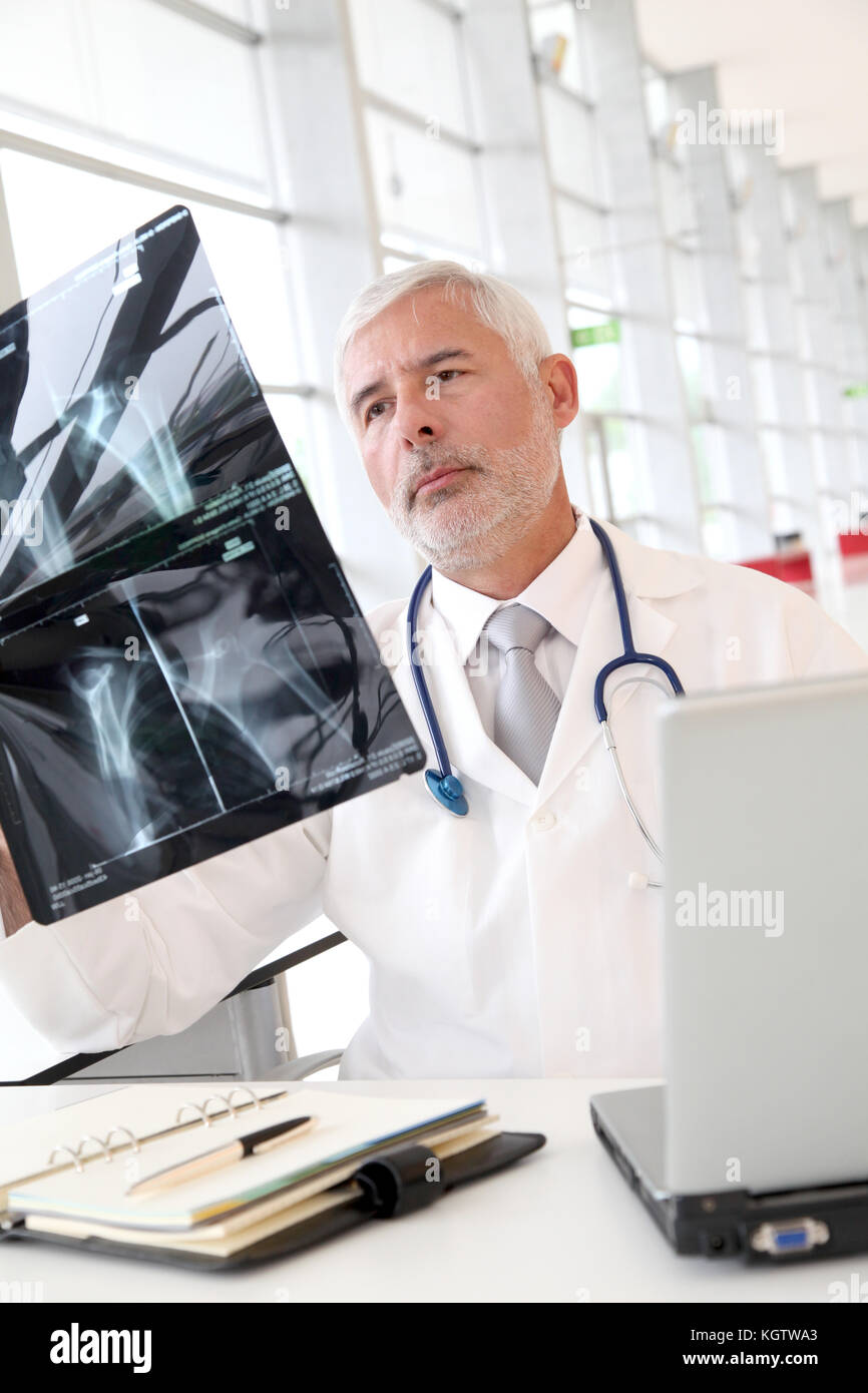 Checking old laptop stethoscope hi-res stock photography and images - Alamy