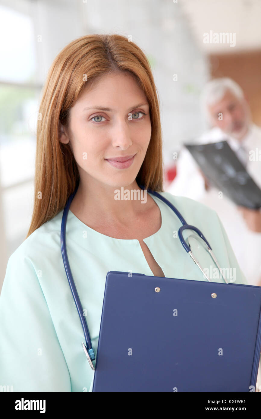 Portrait of beautiful nurse standing in hospital Stock Photo - Alamy