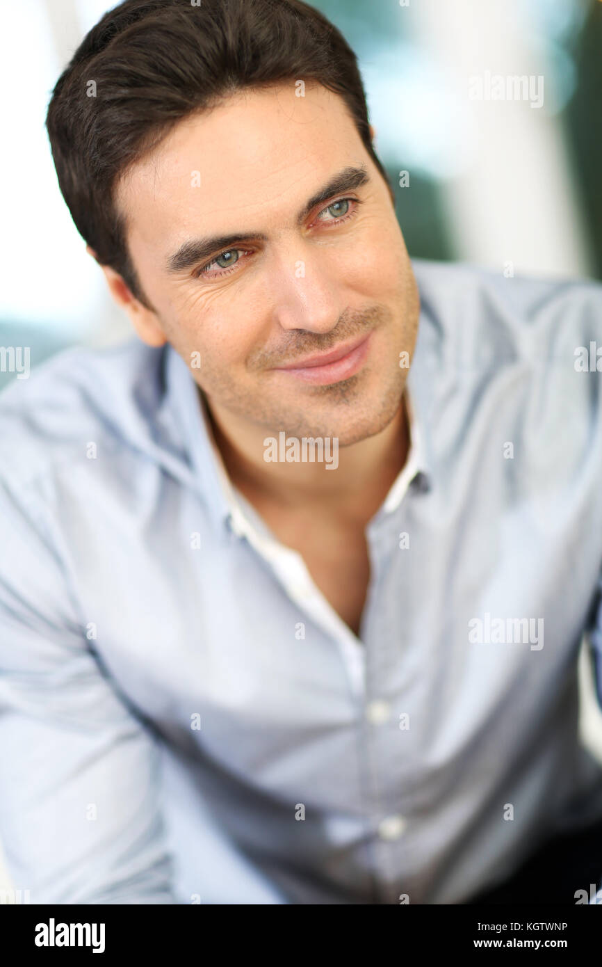 Portrait of handsome man with dark hair Stock Photo - Alamy