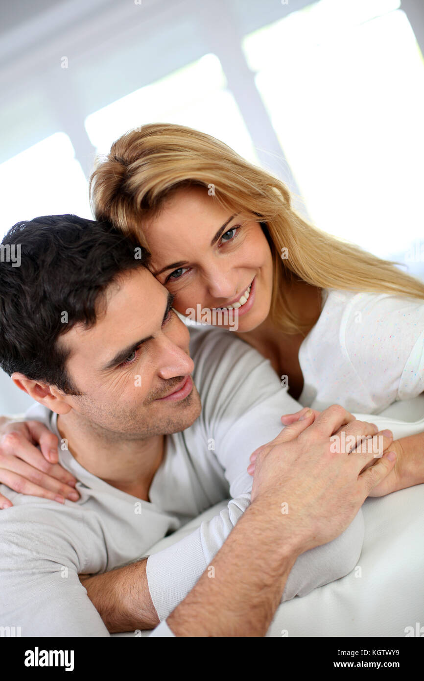 Loving aged couple sitting hi-res stock photography and images - Alamy