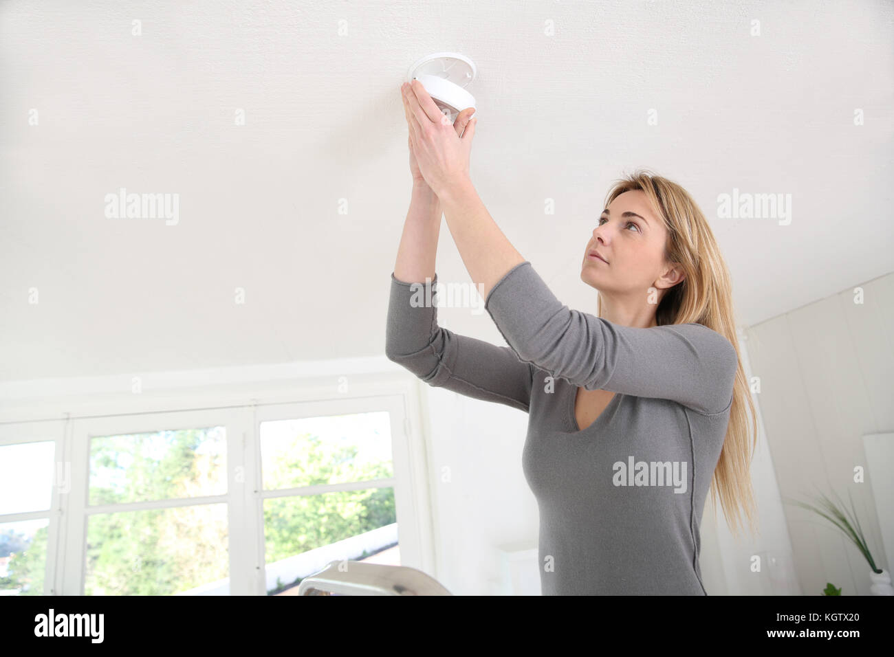 Woman setting up safety hi-res stock photography and images - Alamy