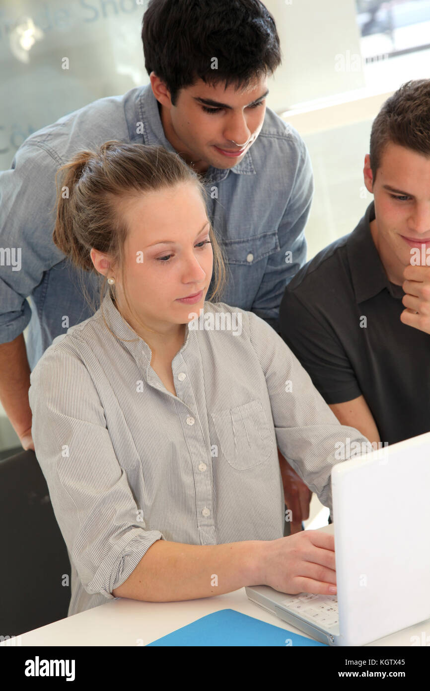 Students working on laptop computer at school Stock Photo - Alamy