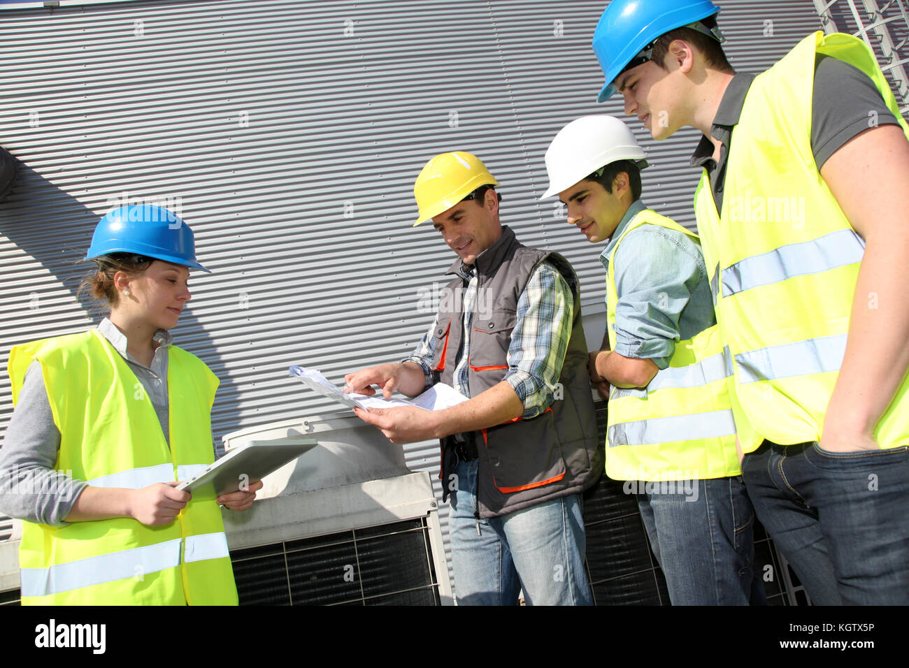 Group of students in professional training Stock Photo - Alamy