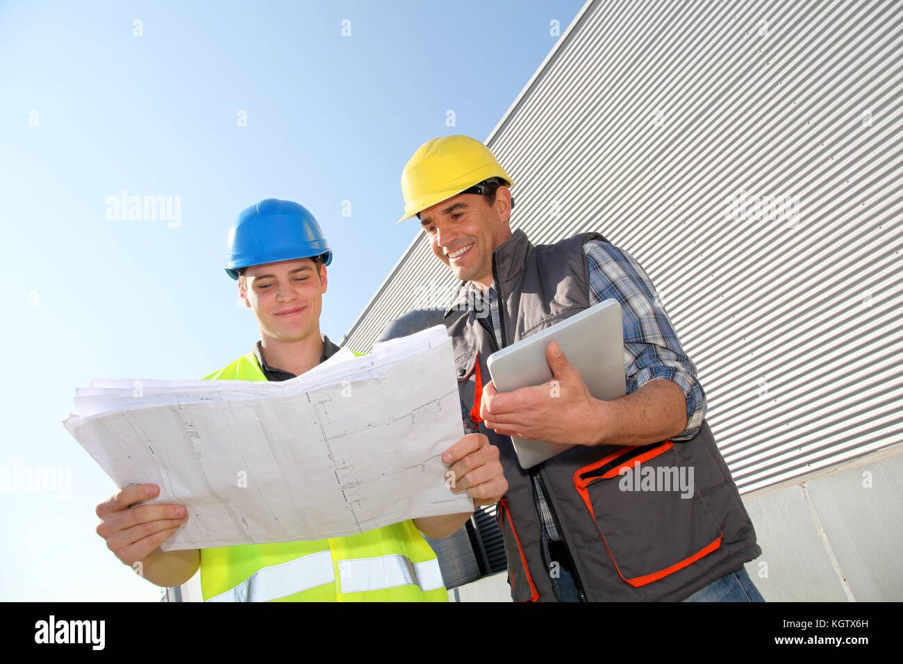 Young people in professional training on industrial site Stock Photo ...