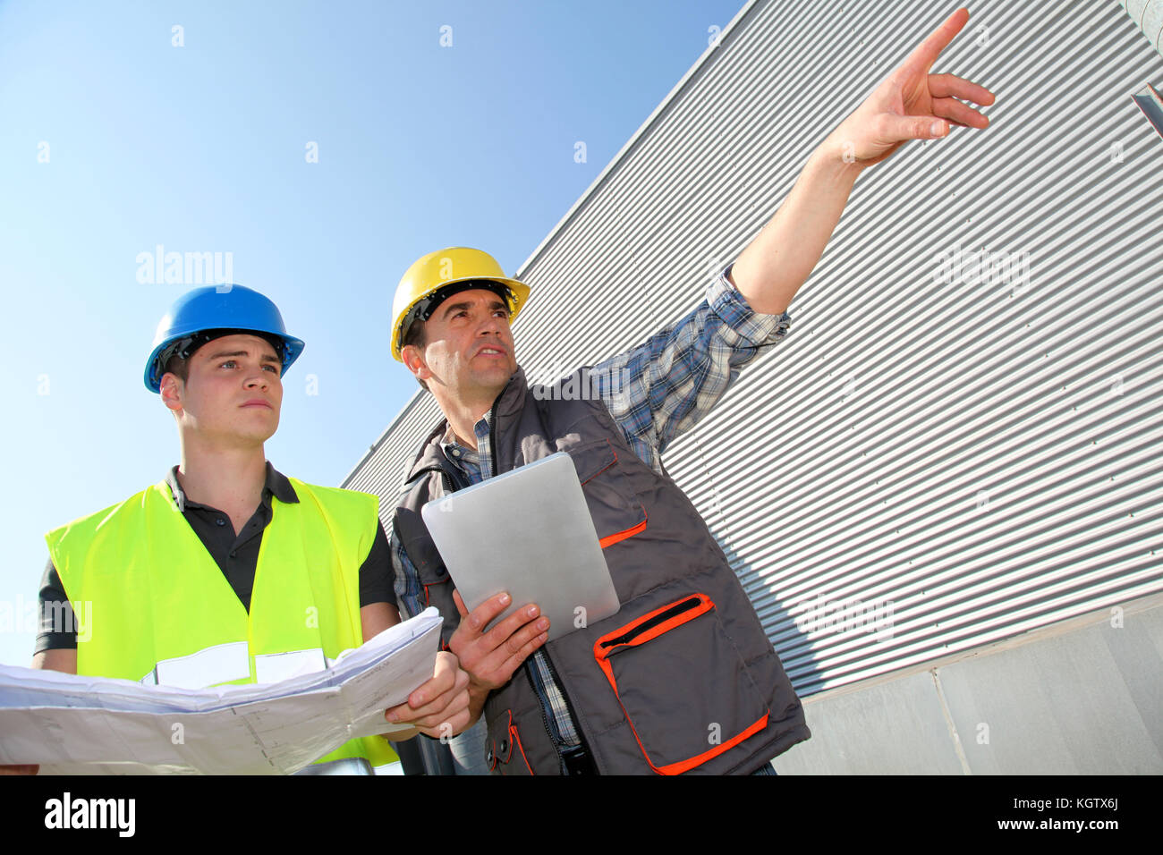 Young people in professional training on industrial site Stock Photo ...
