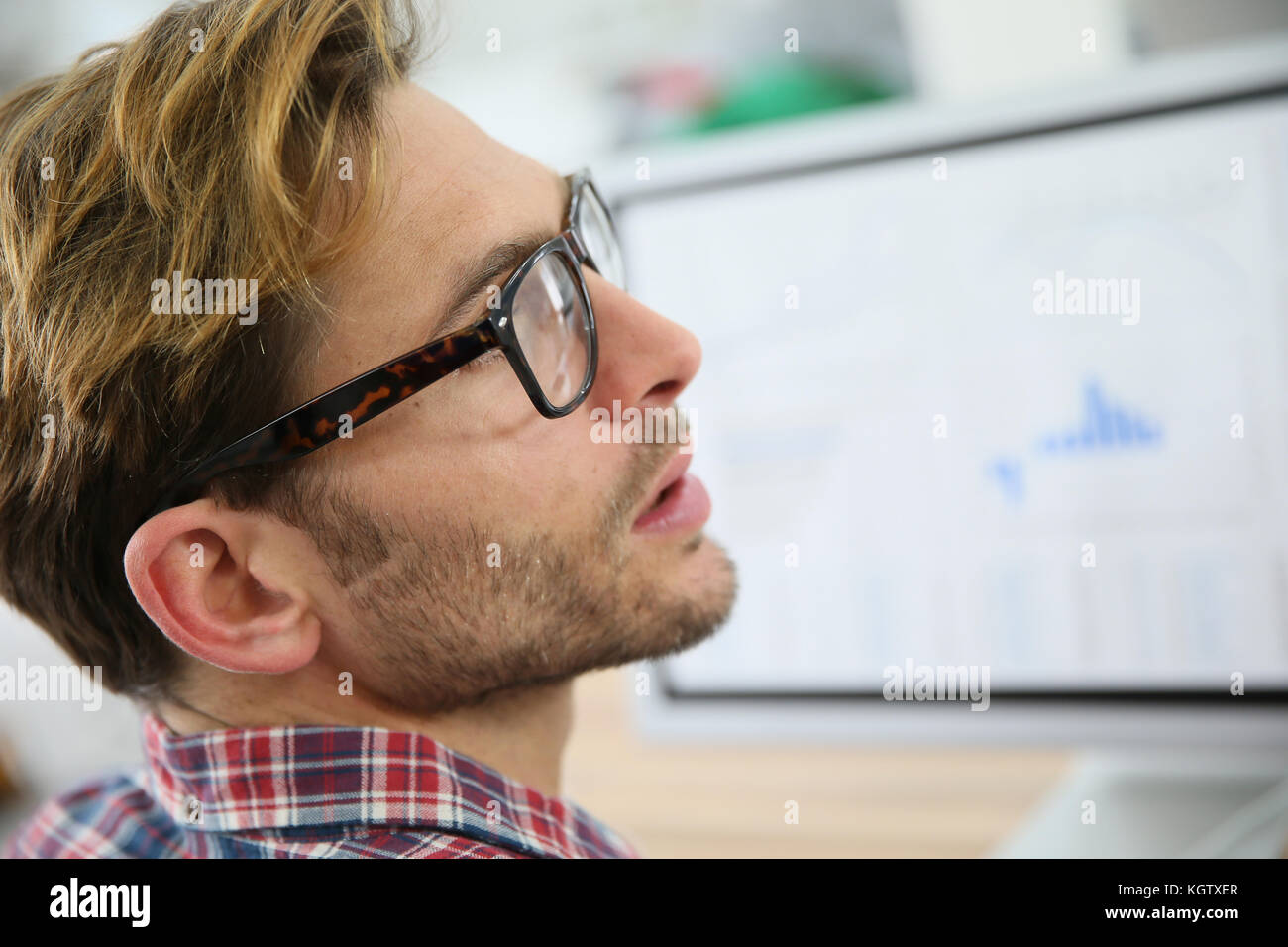 Profile view of trendy guy with eyeglasses on Stock Photo - Alamy