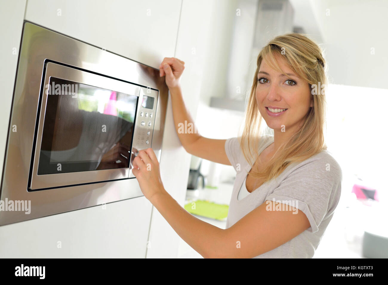 Using Microwave Oven High Resolution Stock Photography and Images - Alamy