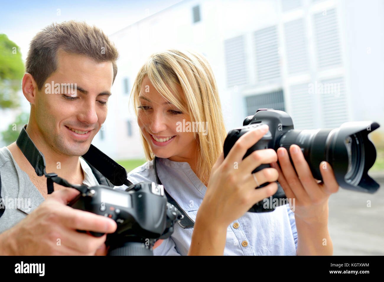 Team of photographers in training session Stock Photo - Alamy
